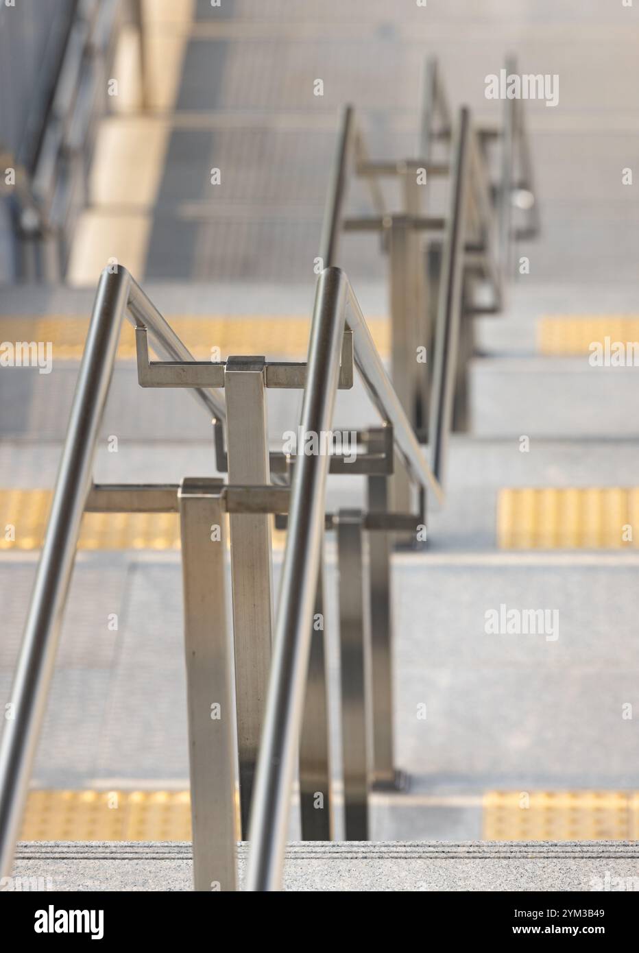 Metallic Railing on high staircase In Building, Stainless steel railing ...