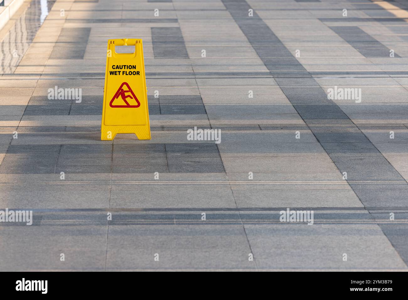 Sign showing warning of cleaning process area, Yellow sign that alerts ...