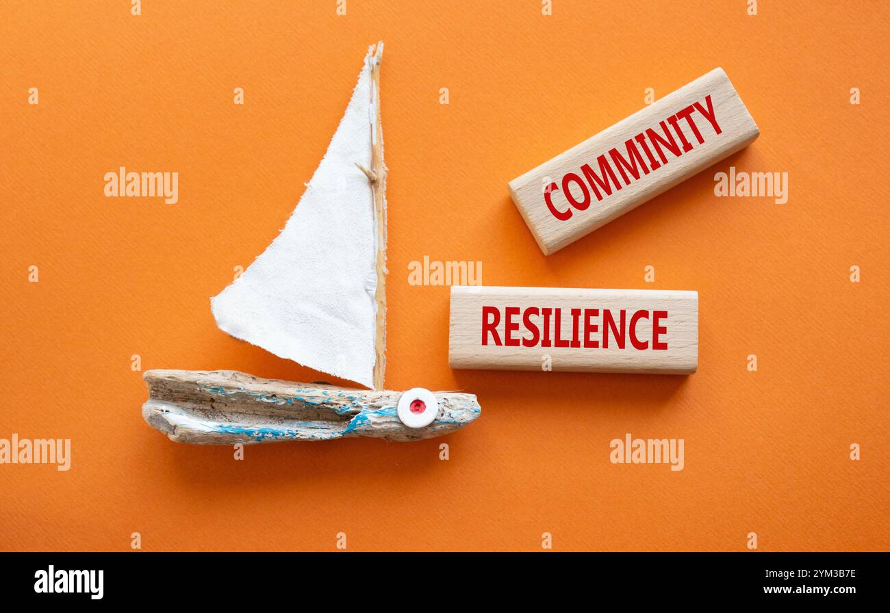 Community Resilience symbol. Wooden blocks with words Community ...