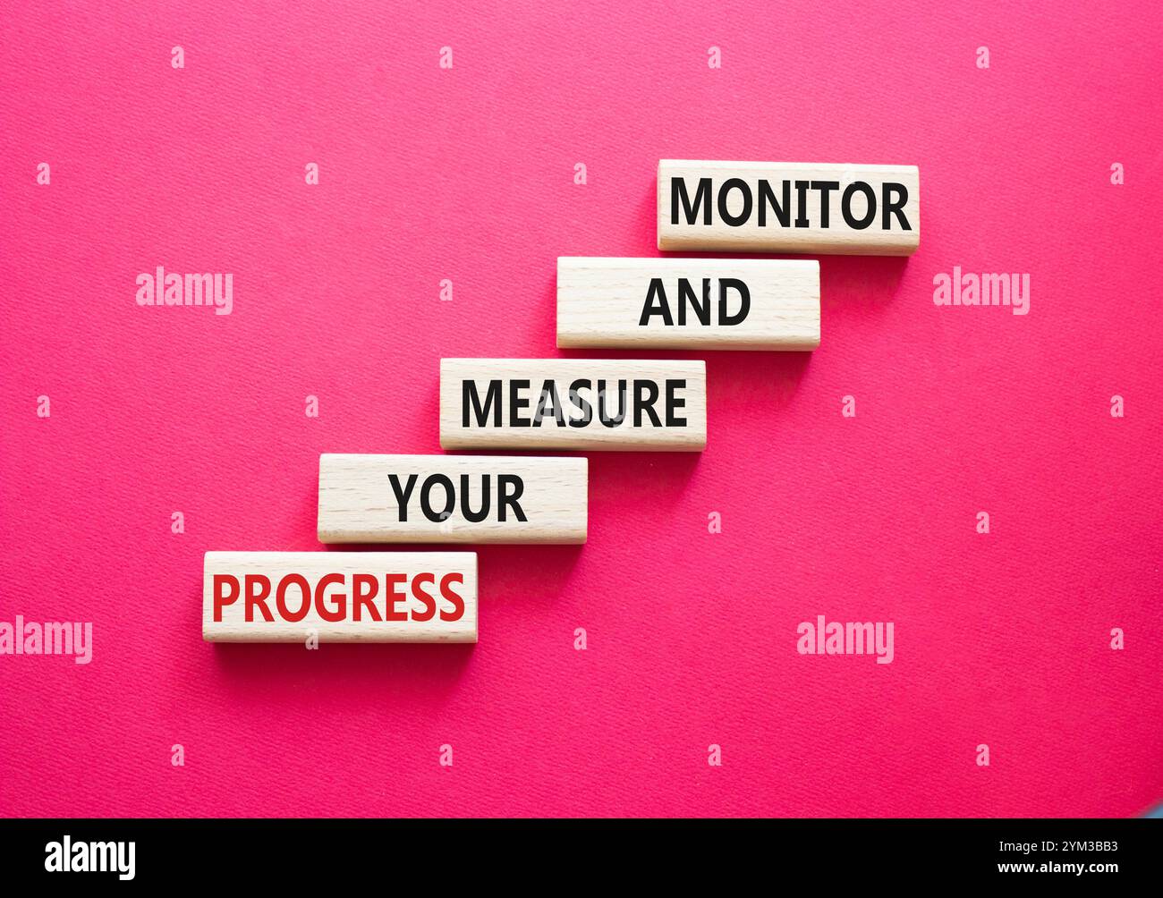 Monitor and Measure your Progress symbol. Wooden blocks with words ...