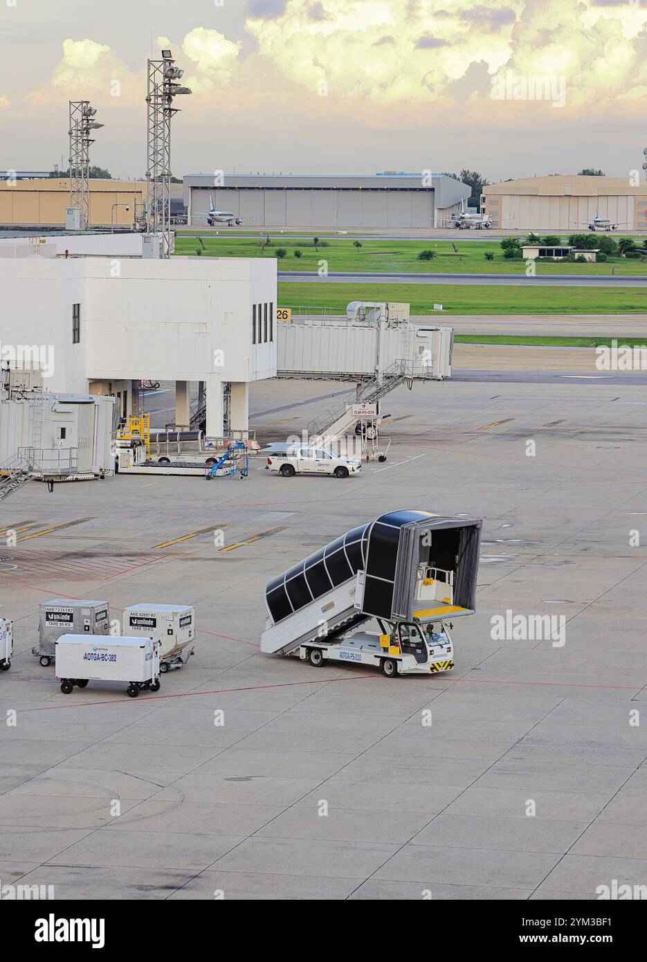 Mobile Passenger Boarding Stairs move for services at Apron near aircraft bay Stock Photo - Alamy