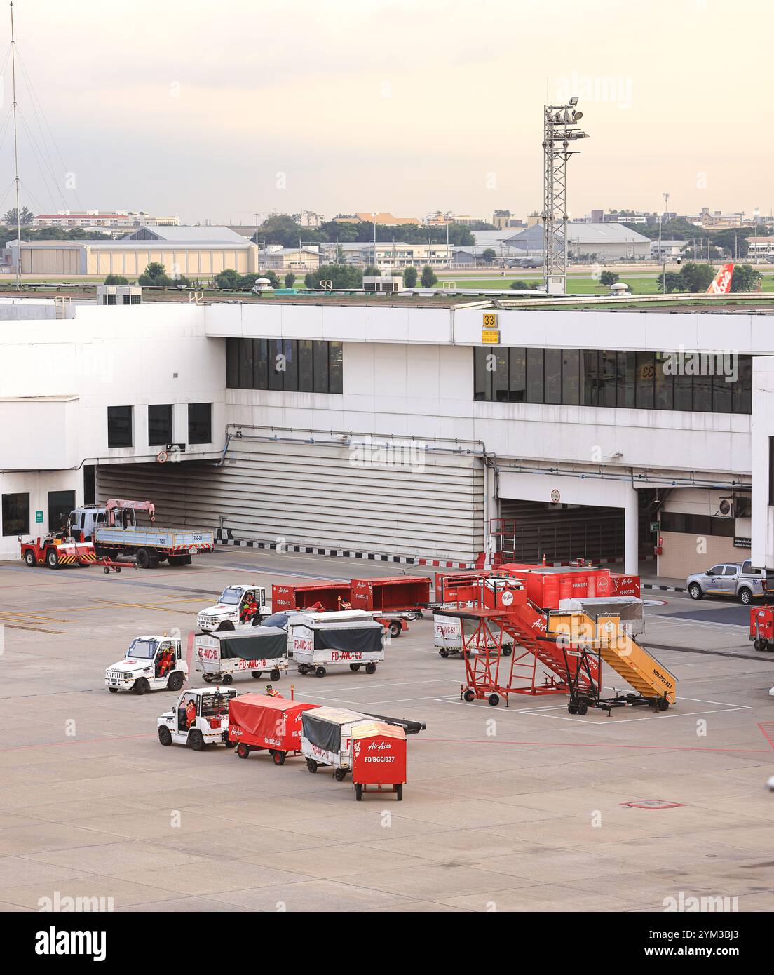Mobile Passenger Boarding Stairs and Airport Baggage Tug (baggage dolly ...