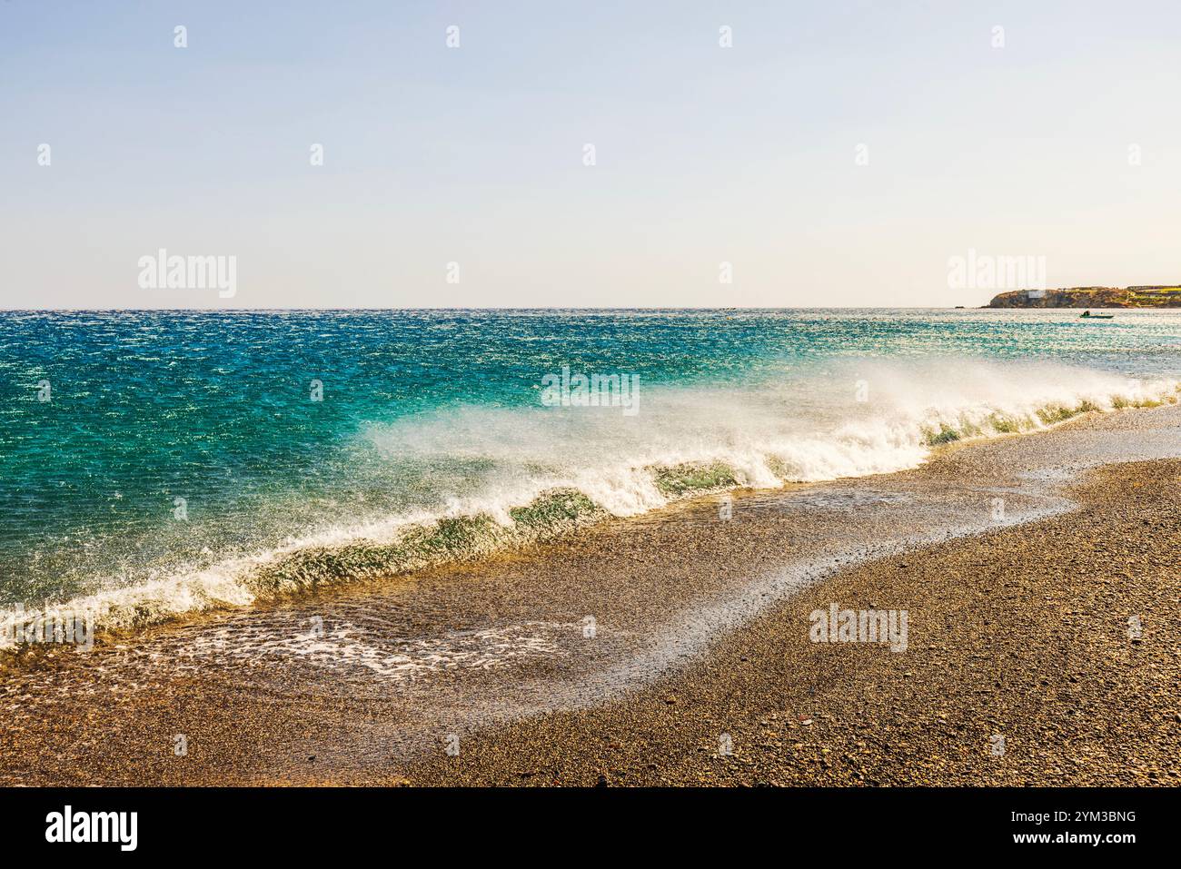 Offshore wind effect with waves pushed back from shore, creating smooth ...