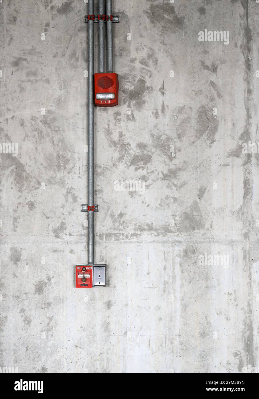 Red fire alarm trigger or switch on the wall with outlet for fire ...