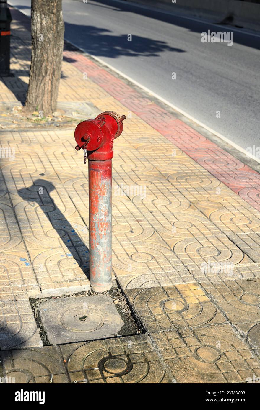 Red fire hydrant at sidewalk Stock Photo - Alamy