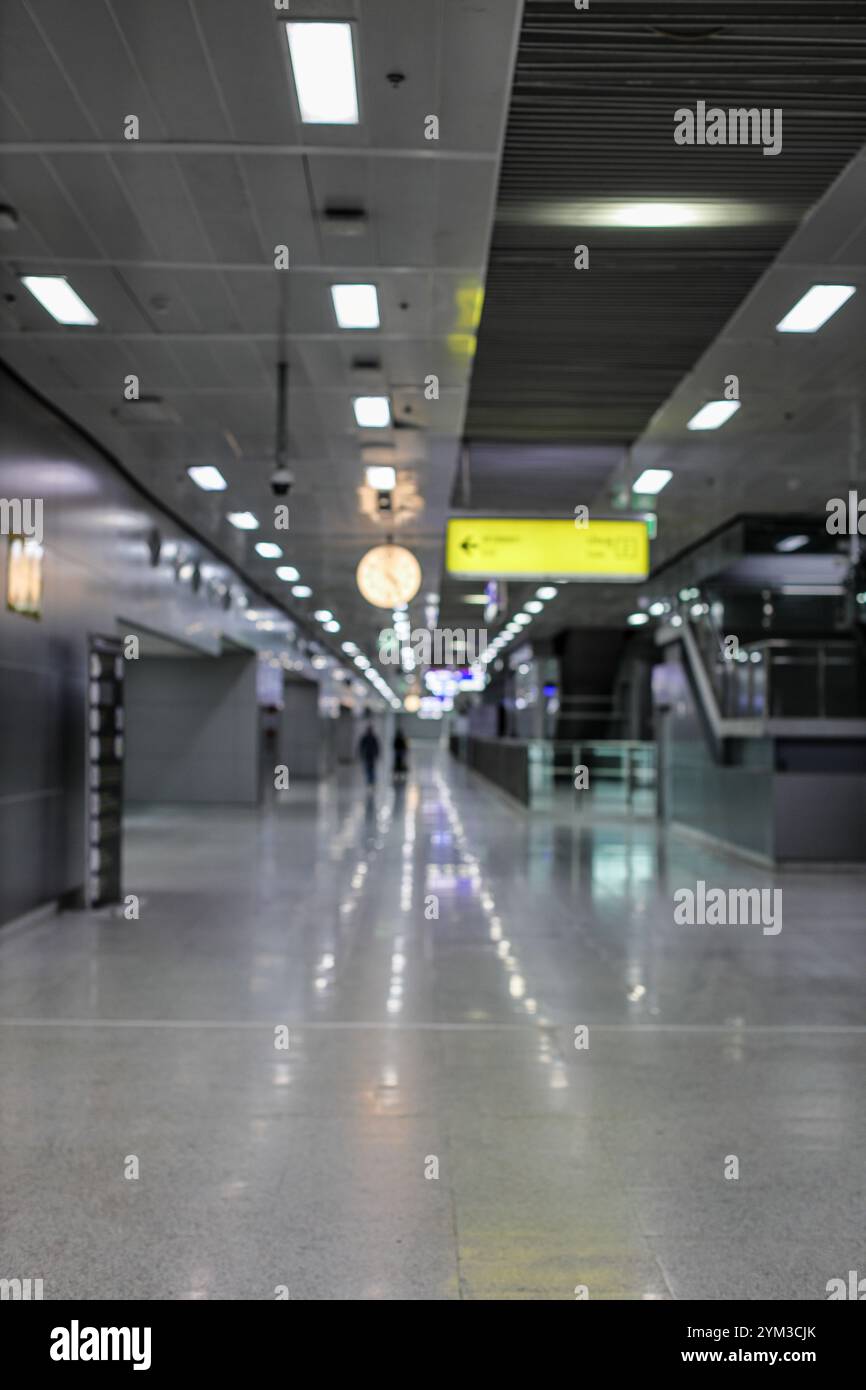abstract blur of corridor or walkway to departure gate in modern ...