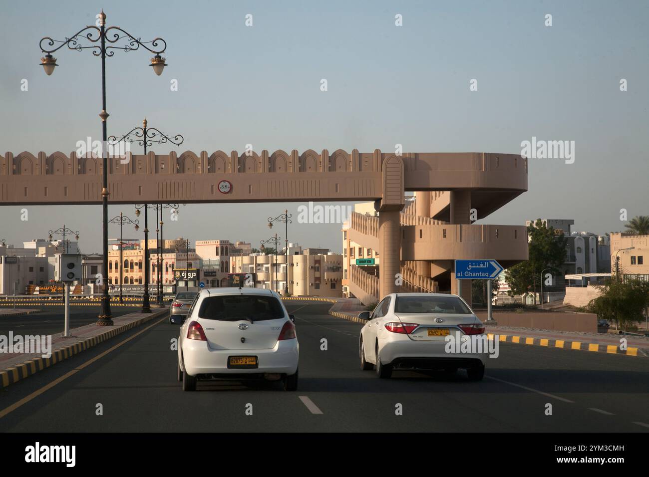 dual carriageway road and footbridge over road nizwa oman middle east ...
