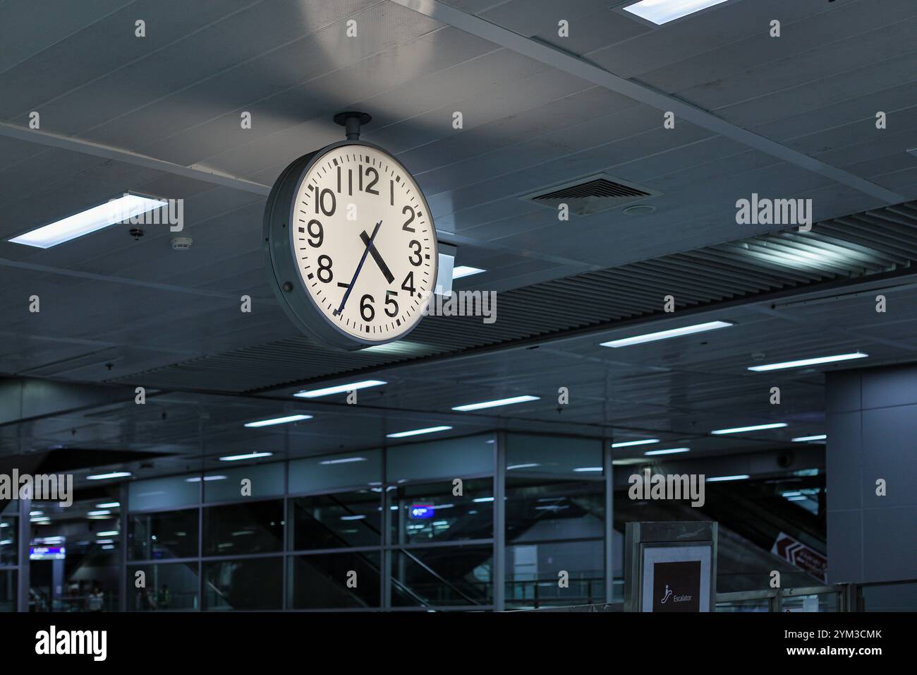 Clock at train station. A large clock faces public transport on a train ...