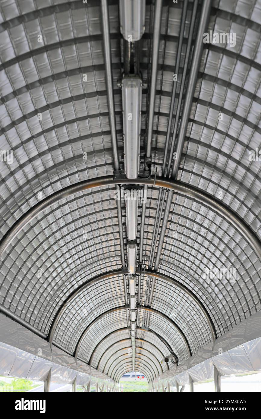 Arched roof made from metal sheet of Pedestrian pathway or corridor or ...
