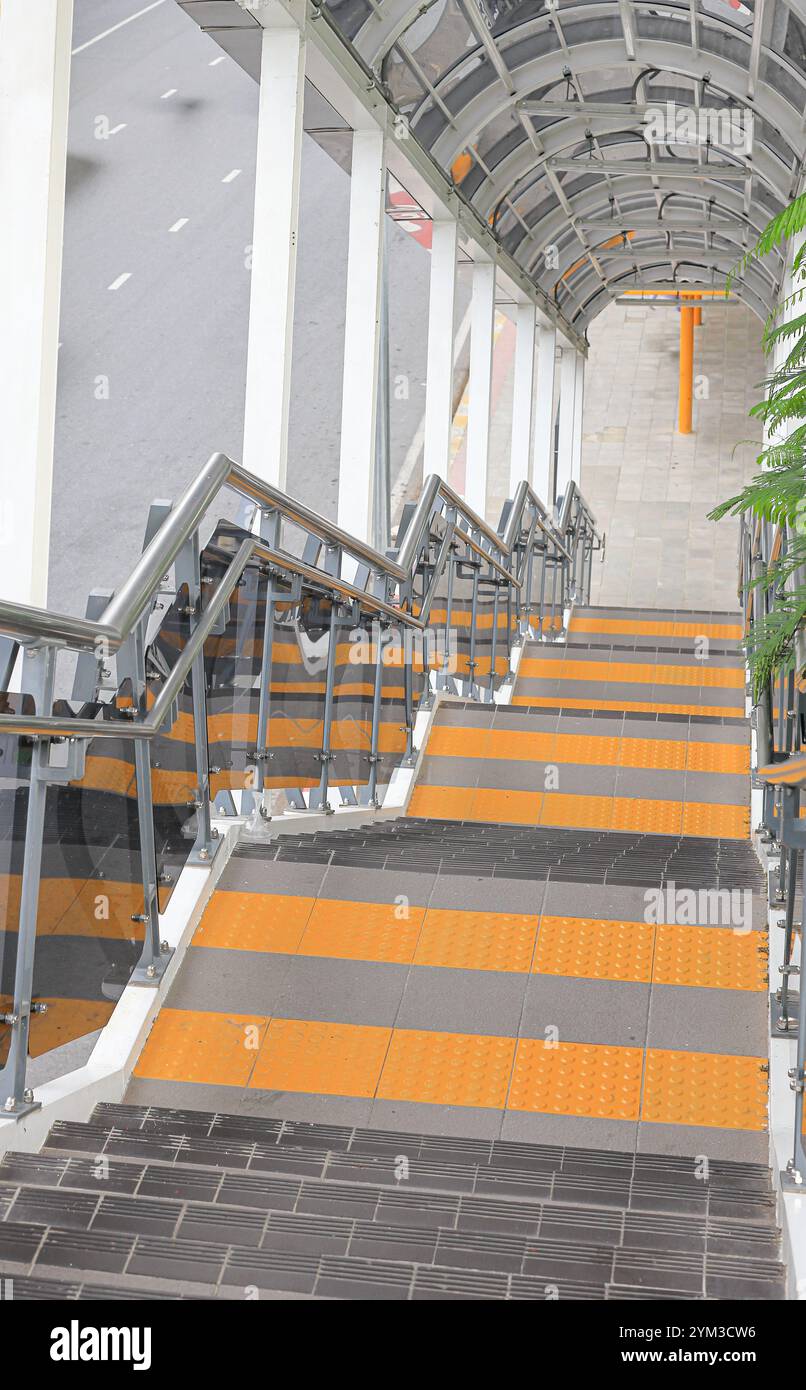Long stair concrete in building, Staircase with stainless steel ...