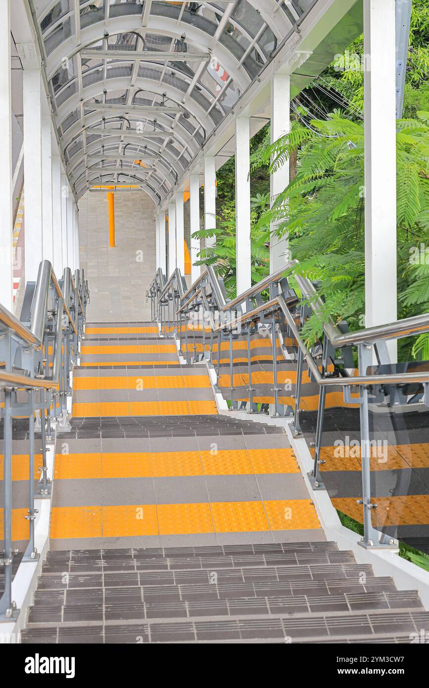 Long stair concrete in building, Staircase with stainless steel ...