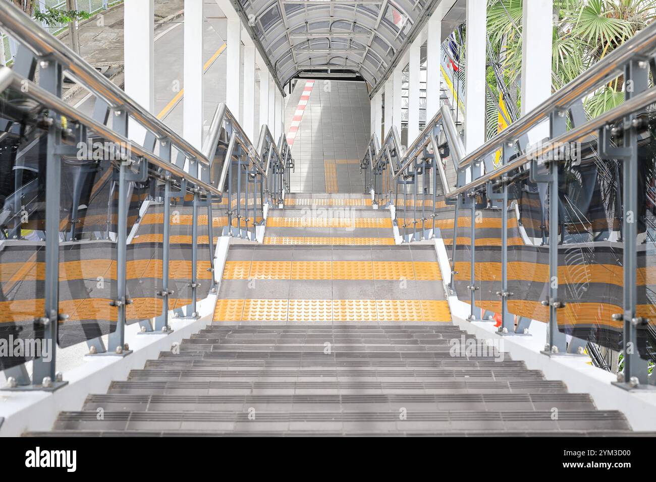 Long stair concrete in building, Staircase with stainless steel ...