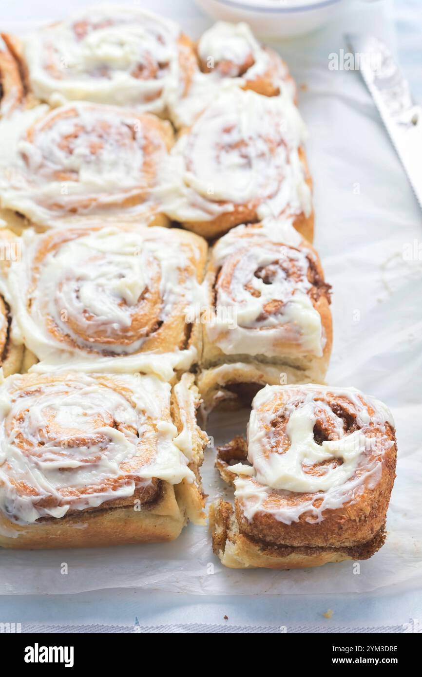 Cinnamon rolls with vanilla cream icing Stock Photo - Alamy