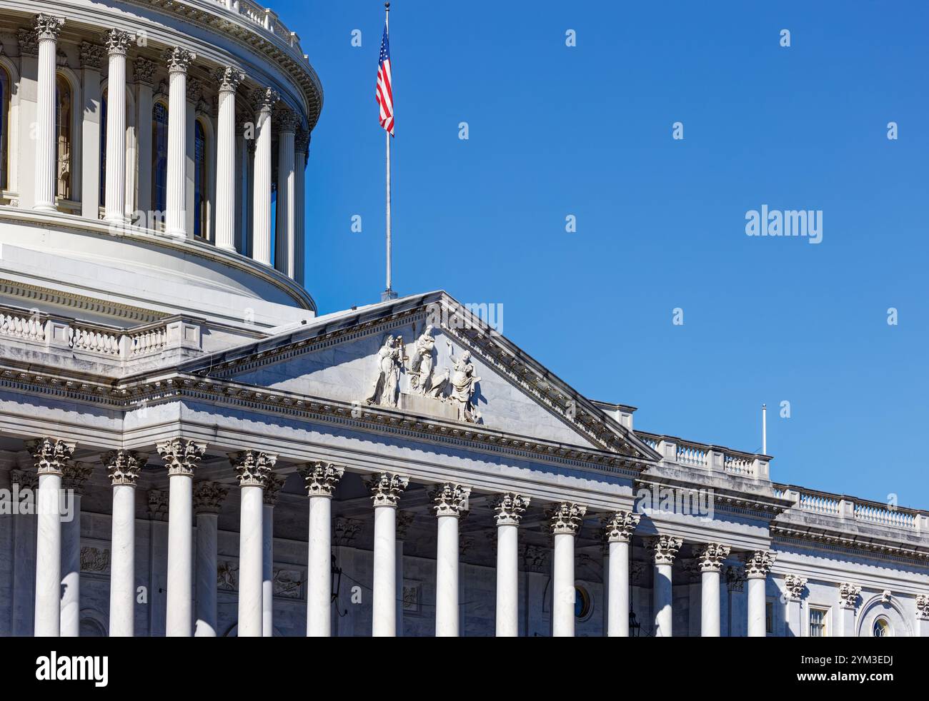 One of the Capitol’s four flags, on the pediment above the East Front ...