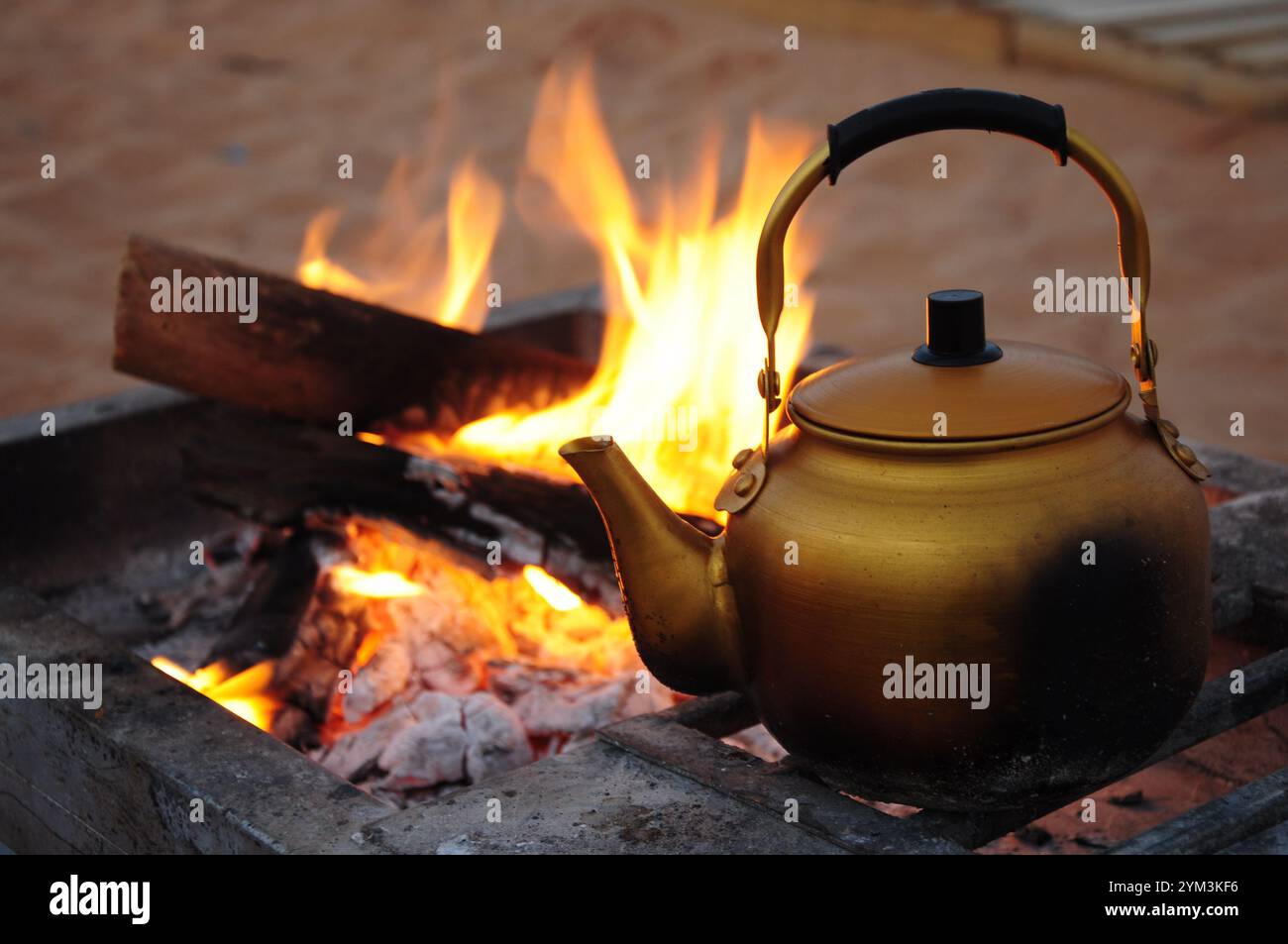 Tea kettle on campfire in hi-res stock photography and images - Alamy