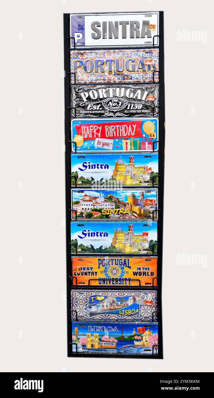 Concertina strip of tourist postcards with cut out/ background of ...