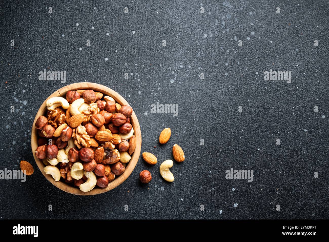 Nuts assortment at black background Stock Photo - Alamy