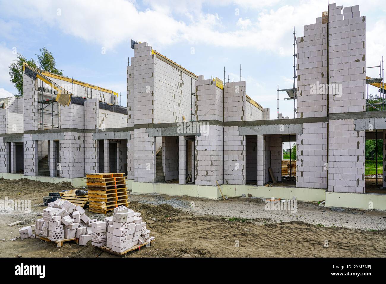 Construction site of a new residential terraced house from expanded ...