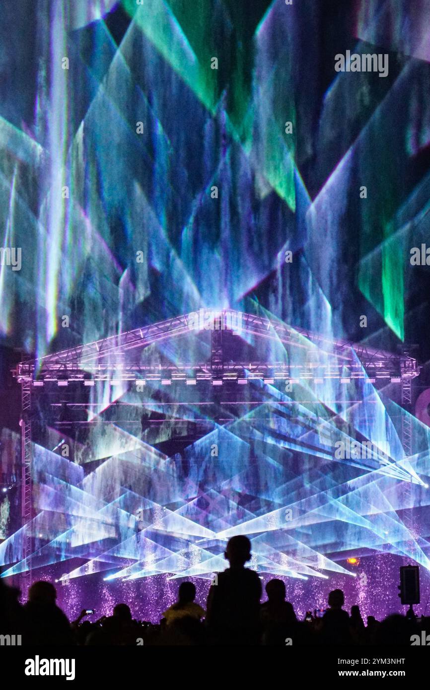 Spectacular bright open air laser show performance at the city festival ...
