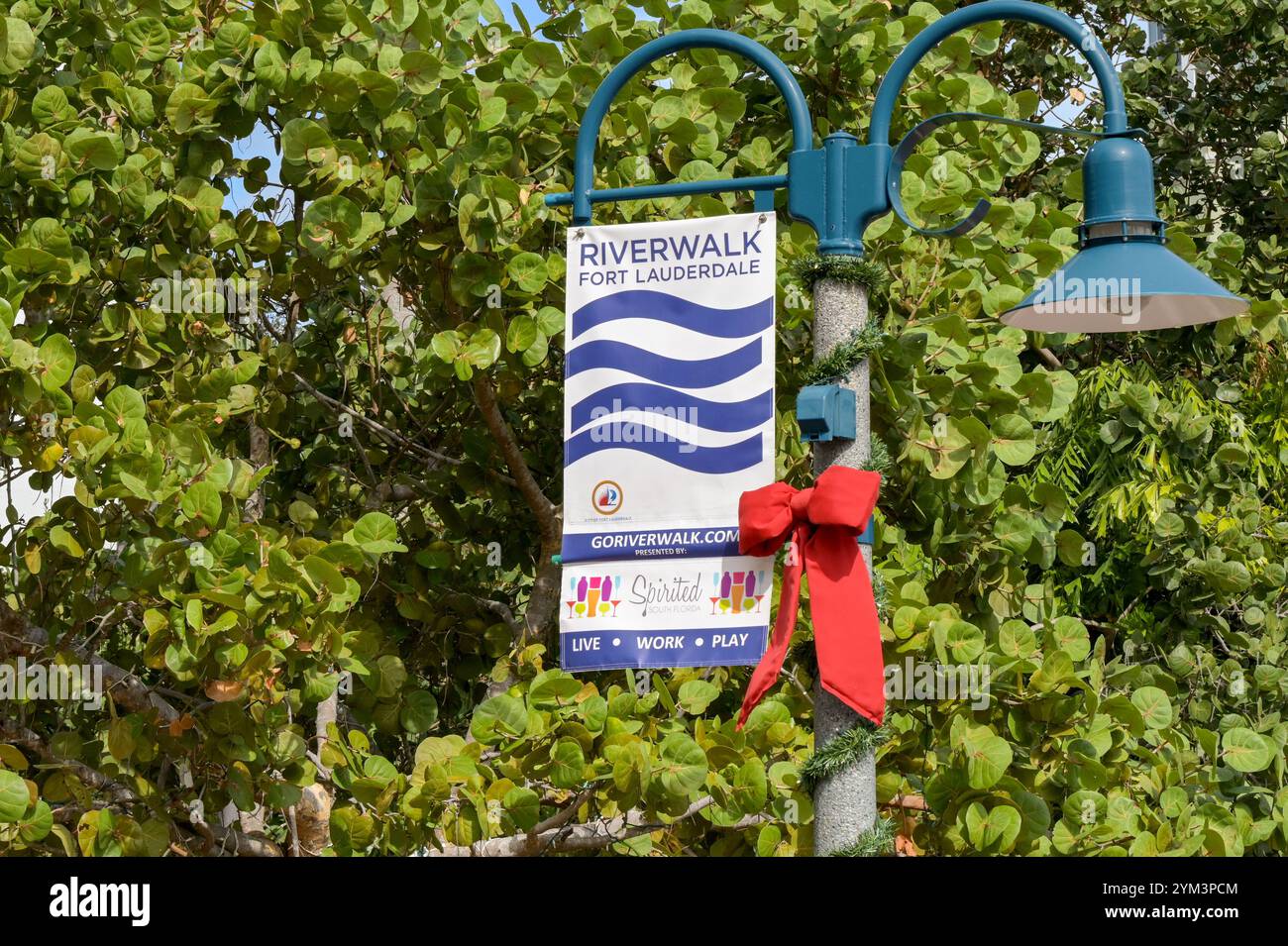 Fort Lauderdale, Florida, USA - 2 December 2024: Sign hanging from a ...