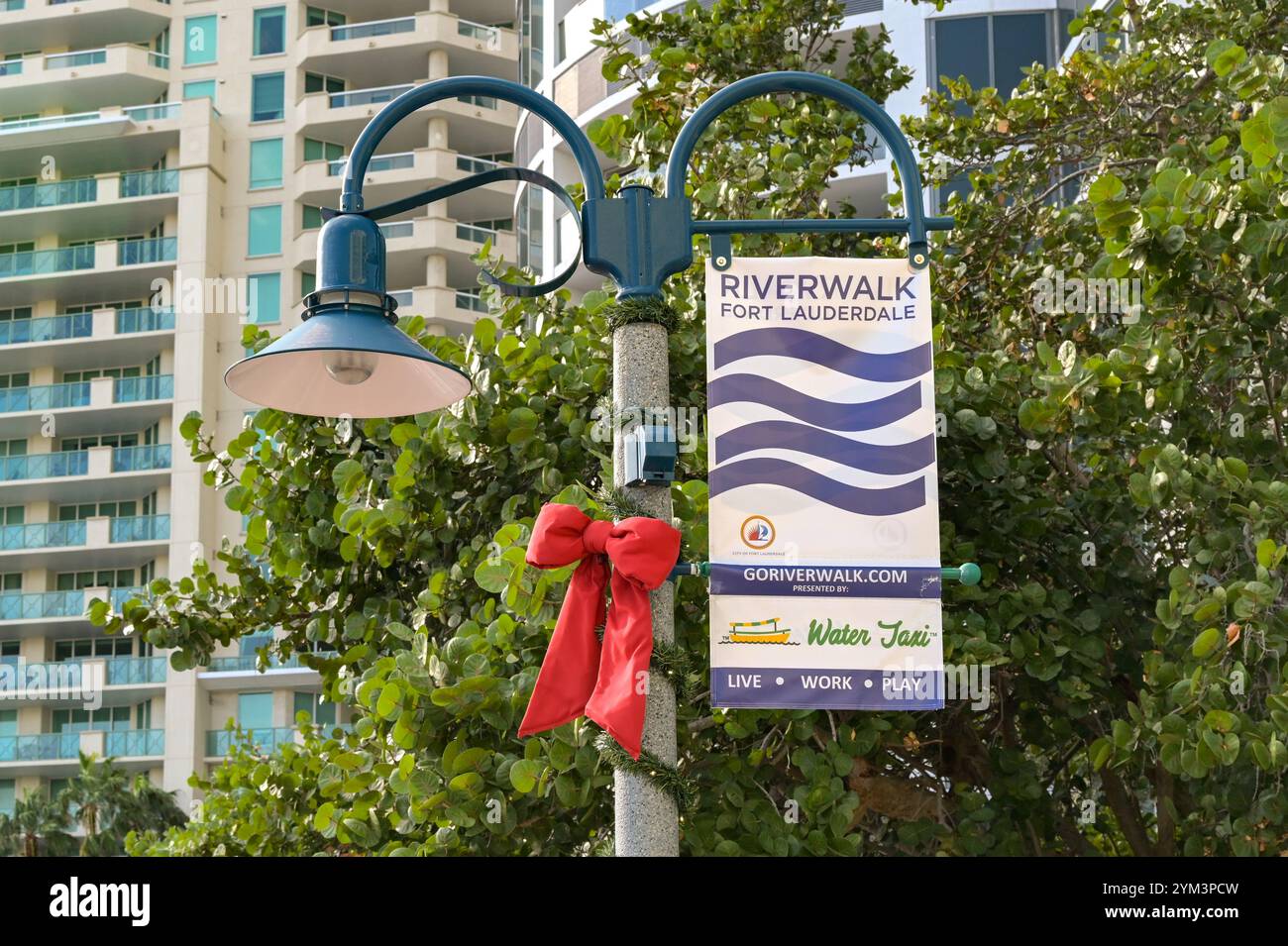 Fort Lauderdale, Florida, USA - 2 December 2024: Sign hanging from a ...