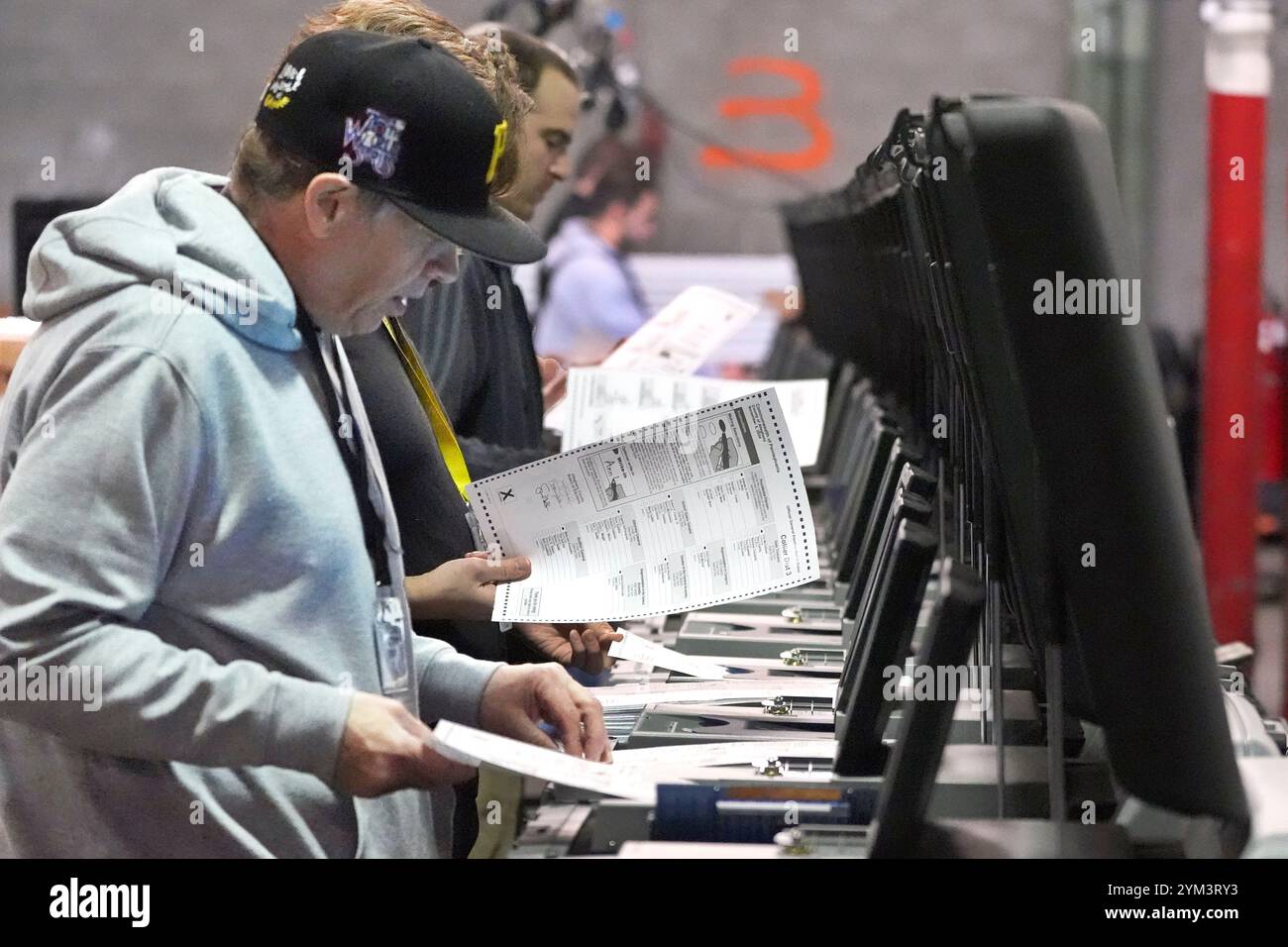 Election workers recount ballots from the recent Pennsylvania Senate ...