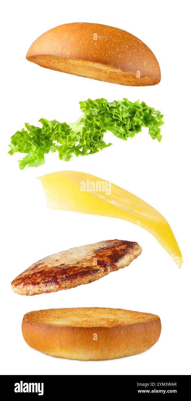 Burger explosion, flying layers isolated Stock Photo - Alamy
