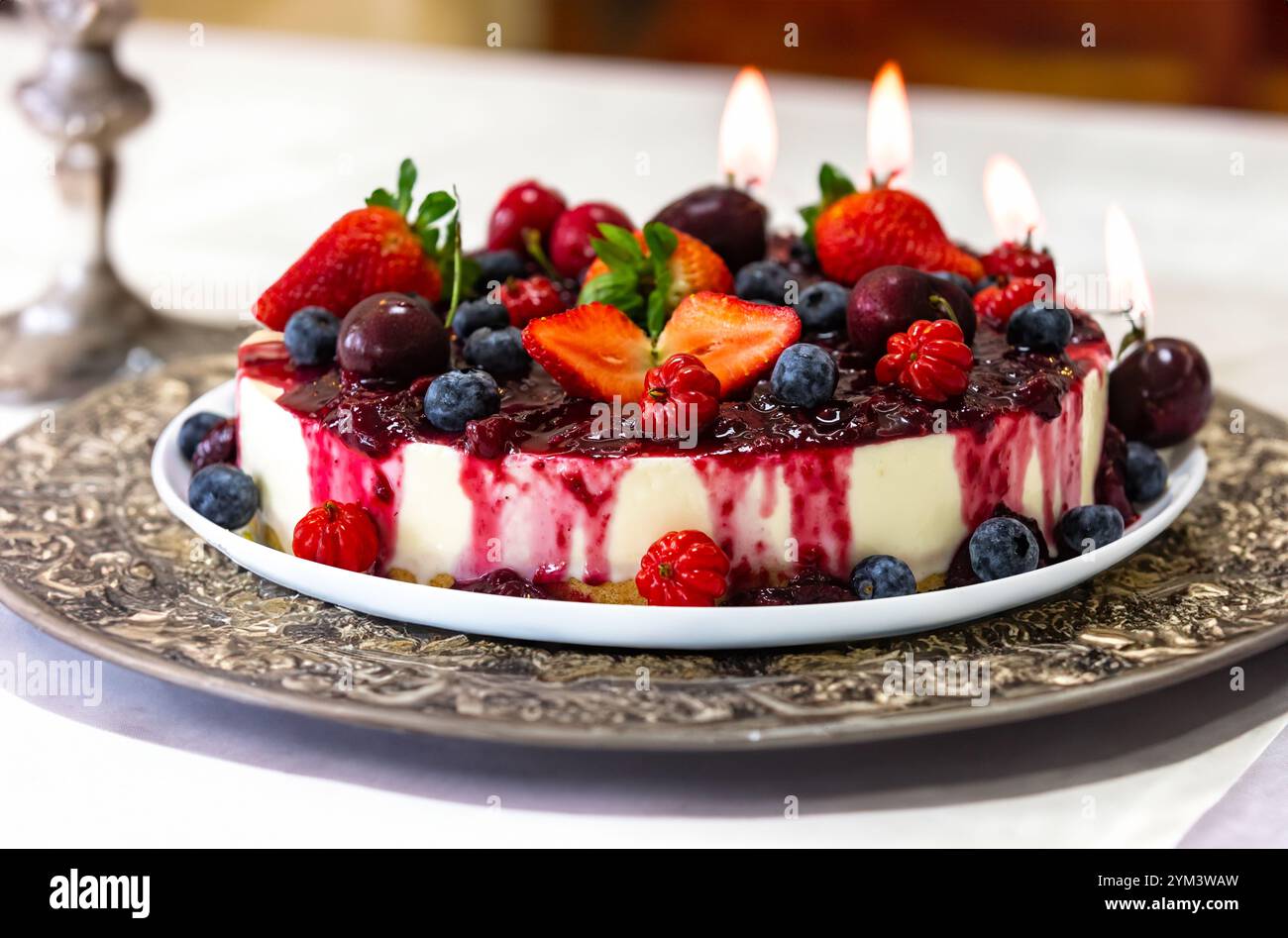 Traditional Christmas red fruit cheesecake with creative and luxurious ...