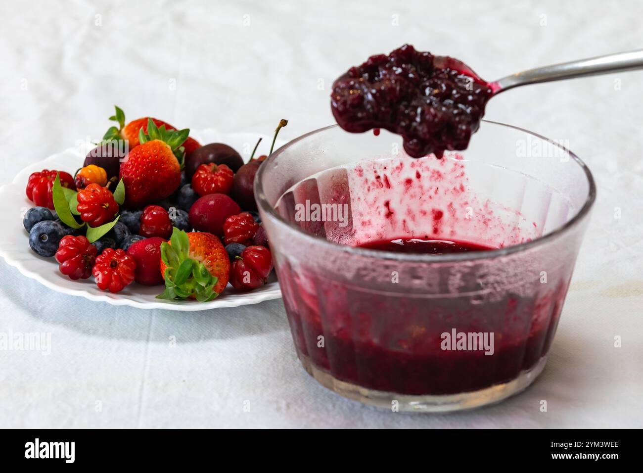 Traditional artisanal jam made from organic red fruits. Creative food ...
