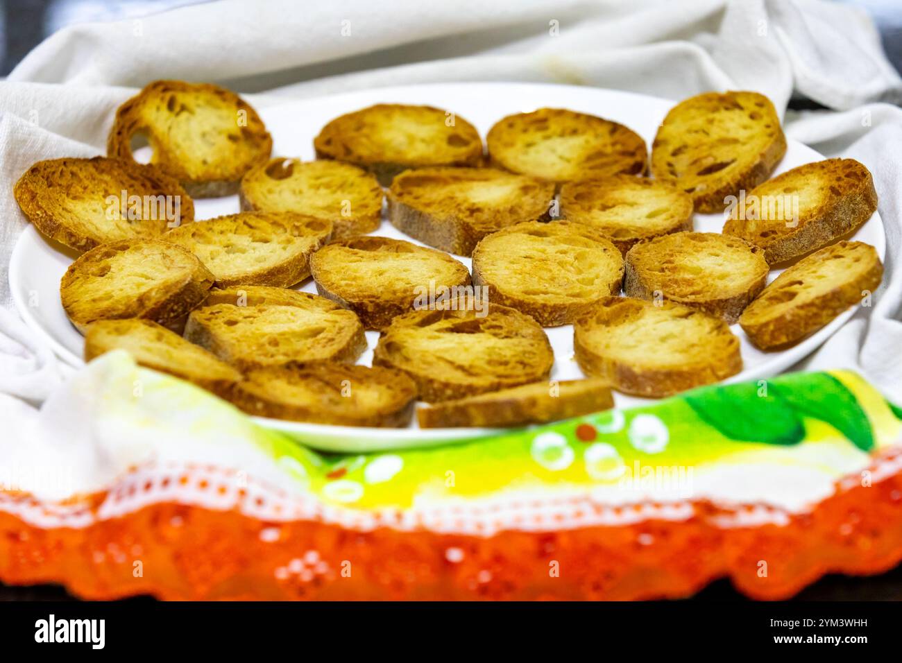 Rustic sourdough bread toasts on white cloth Stock Photo - Alamy