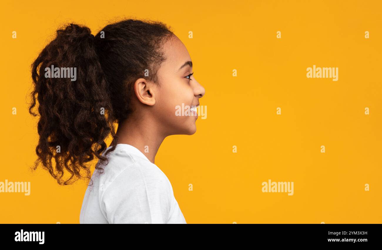 Side view profile portrait of cute African American girl Stock Photo ...