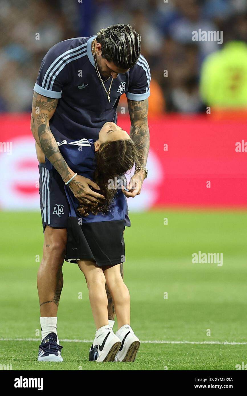 Francesca, daughter of Argentina’s midfielder Rodrigo De Paul, embraces ...
