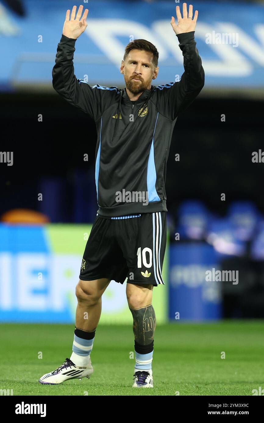 Argentina’s forward Lionel Messi waves supporters during the warm up ...