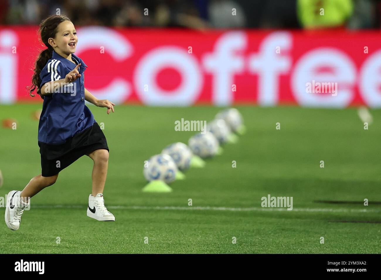 Francesca, daughter of Argentina’s midfielder Rodrigo De Paul, runs on ...