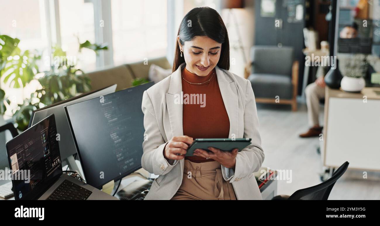Programmer, business woman and research on tablet for software ...