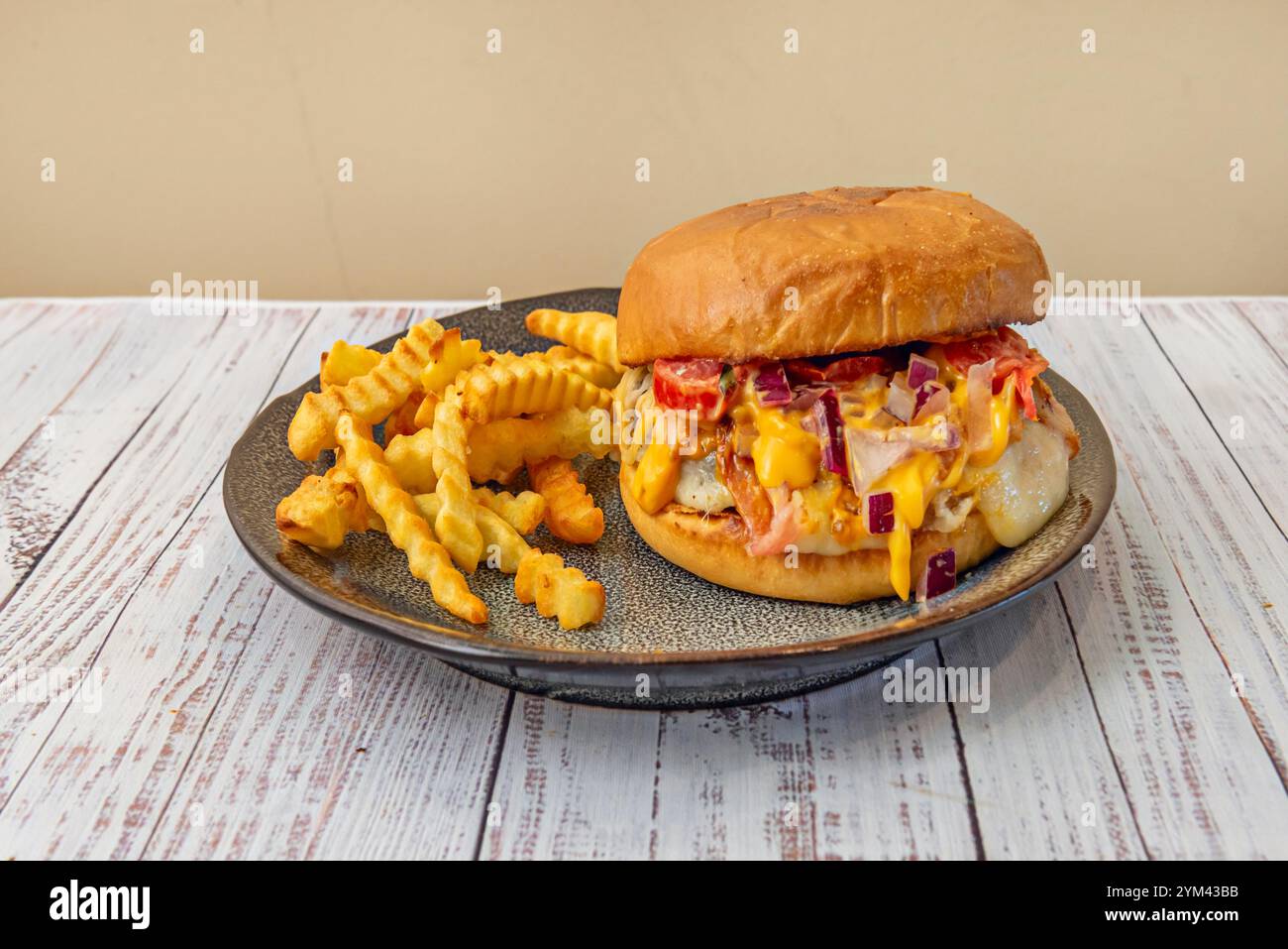 Beef burgers with fries are a classic dish, especially popular in ...