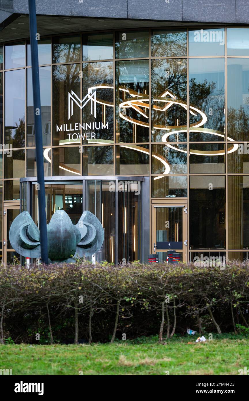 Sign and entrance of the Millenium tower, a renovated office building ...