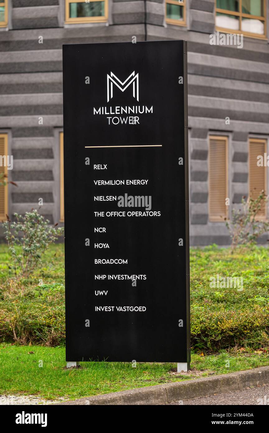Sign and entrance of the Millenium tower, a renovated office building ...