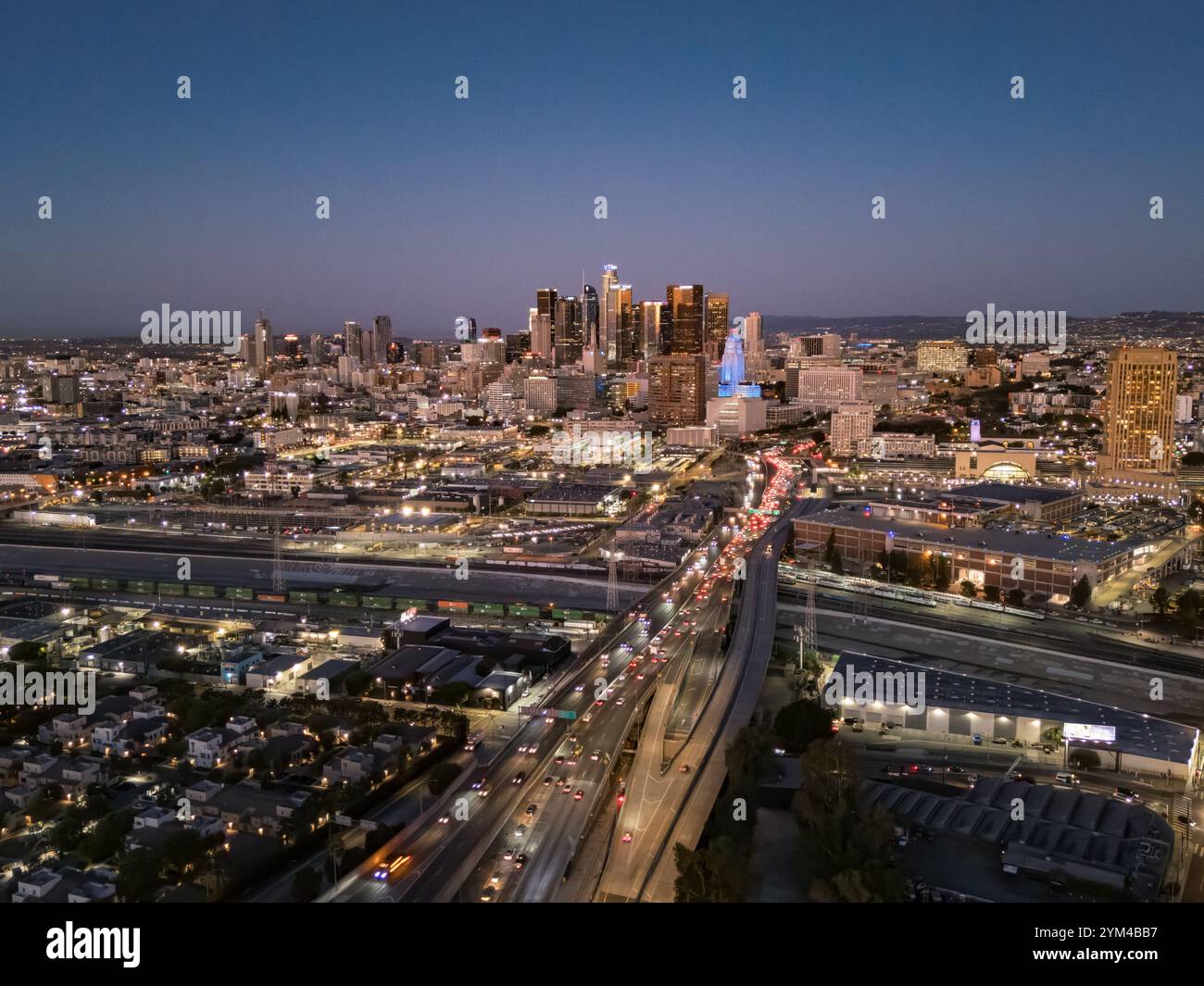 Aerial view of Los Angeles downtown at night, with the traffic on the ...