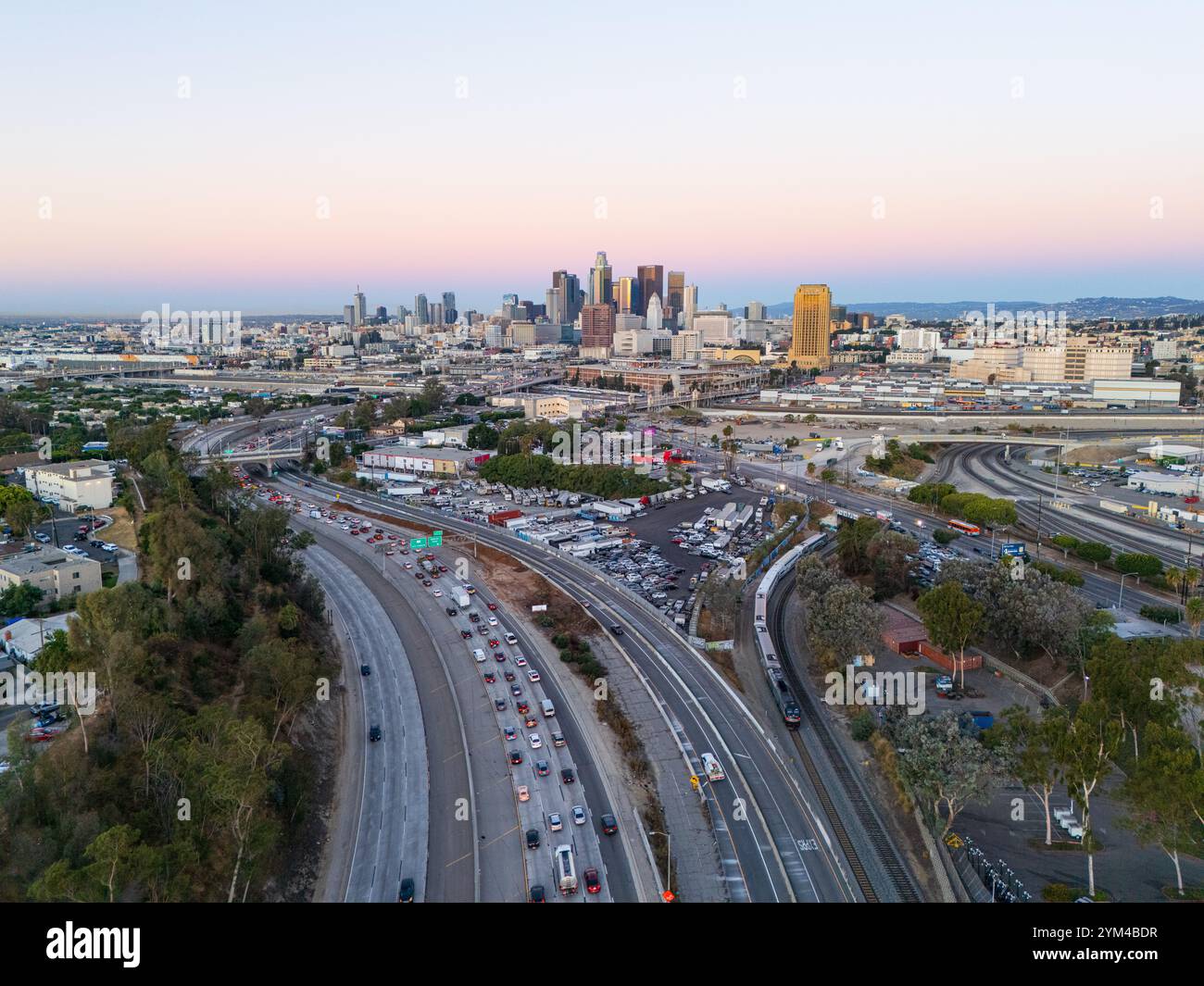 Aerial view of Los Angeles downtown at dawn, with the traffic on the ...