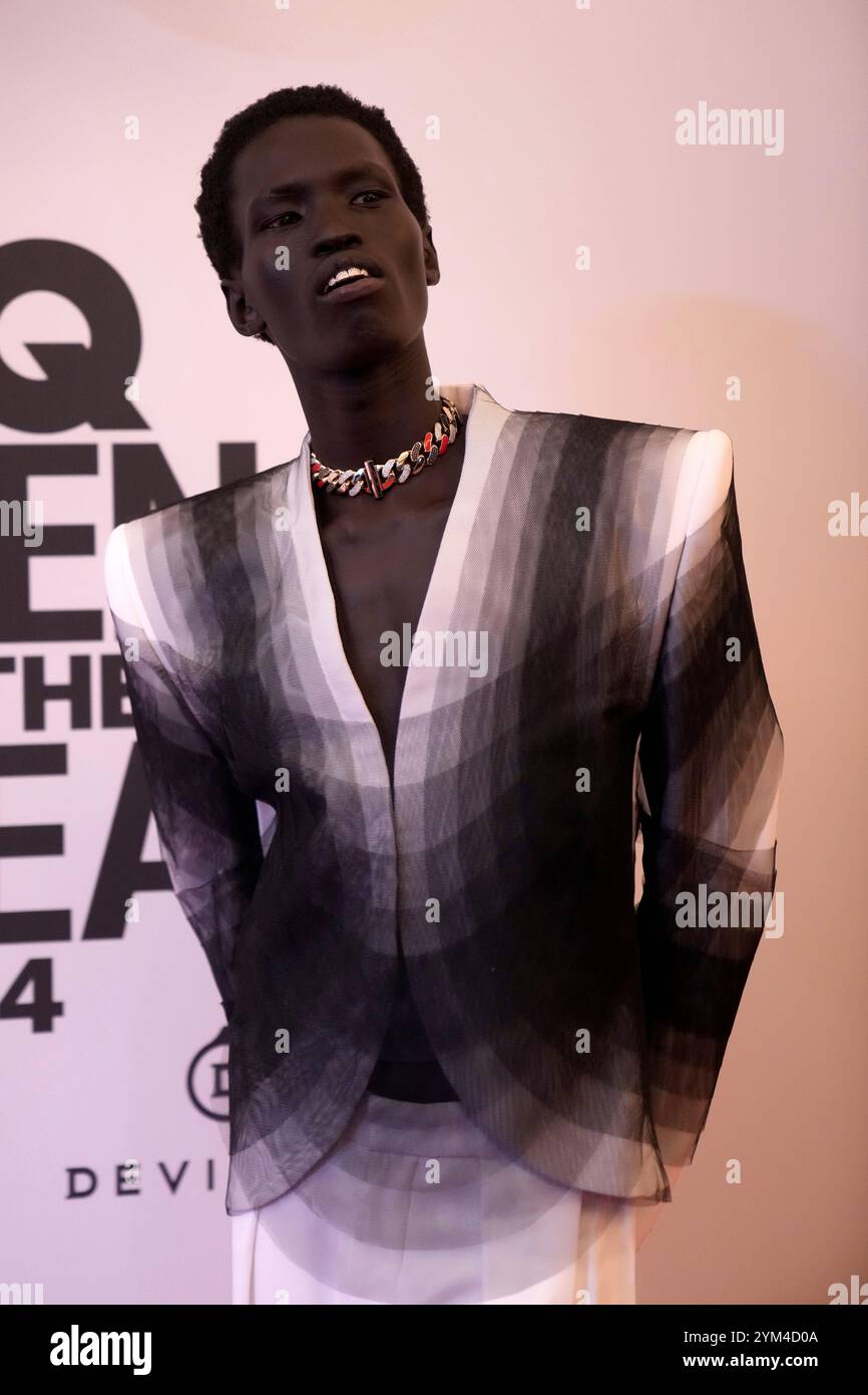 South Sudanese model Mamuor Majeng poses for photographers upon arrival ...