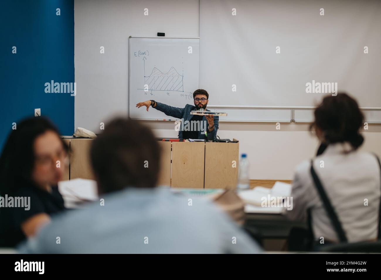 Lecture in progress with engaged students in a modern classroom Stock ...