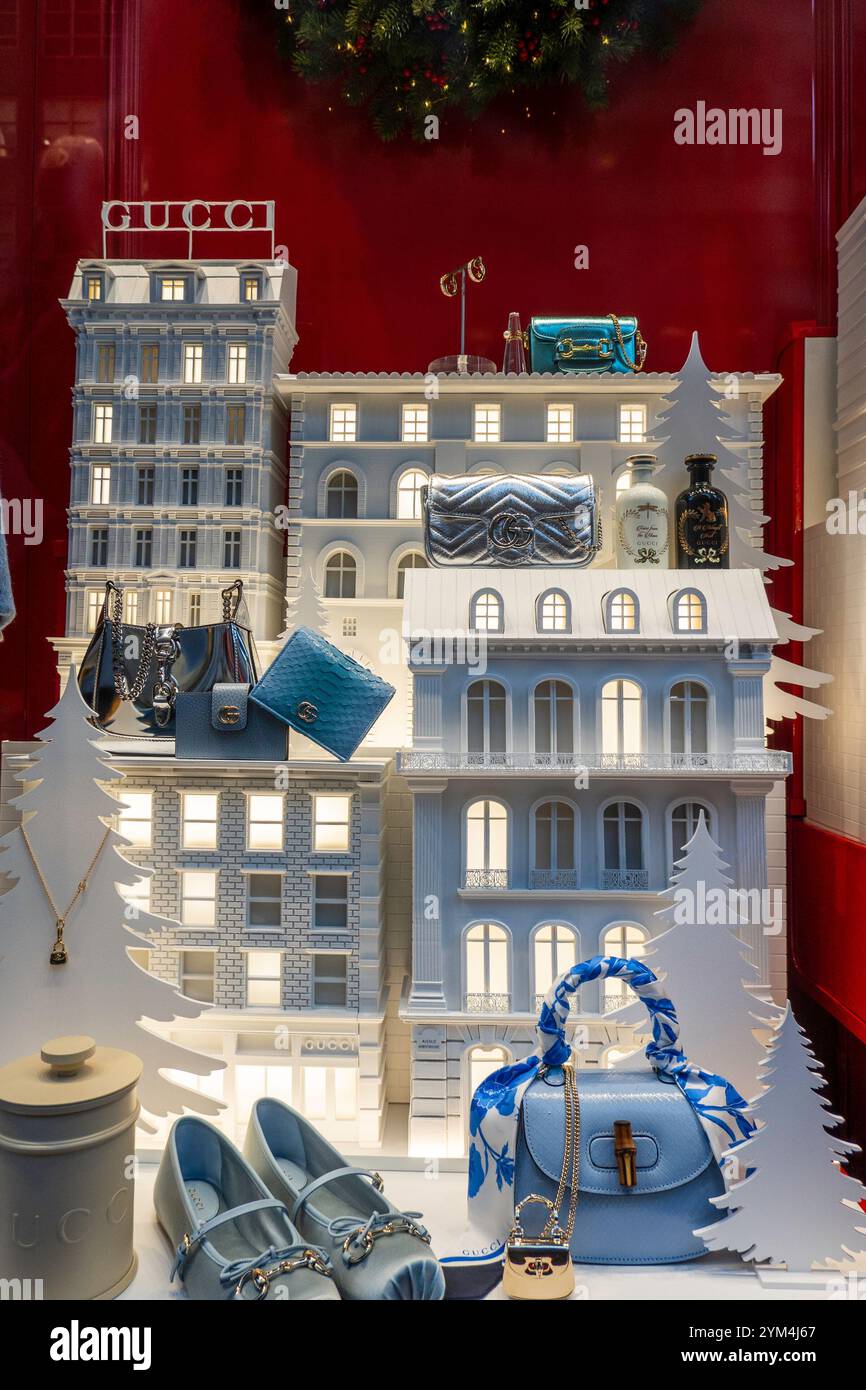 The high-end fashion Gucci store located on fifth Avenue is decorated ...