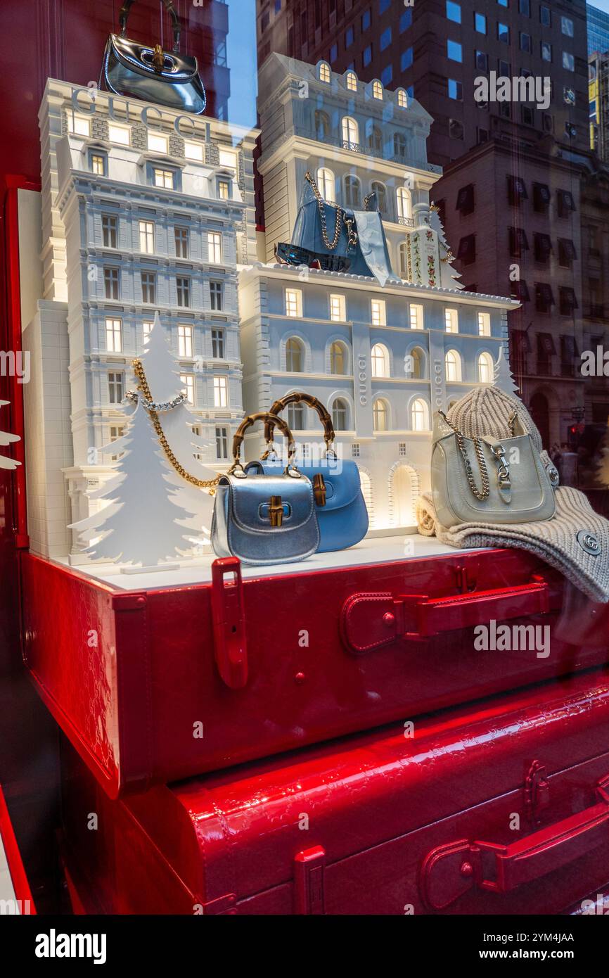 The high-end fashion Gucci store located on fifth Avenue is decorated ...