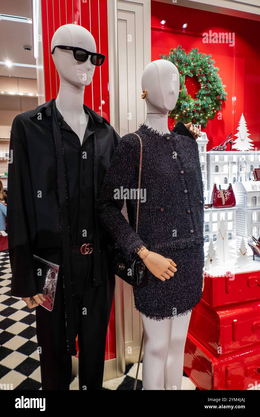 The high-end fashion Gucci store located on fifth Avenue is decorated ...