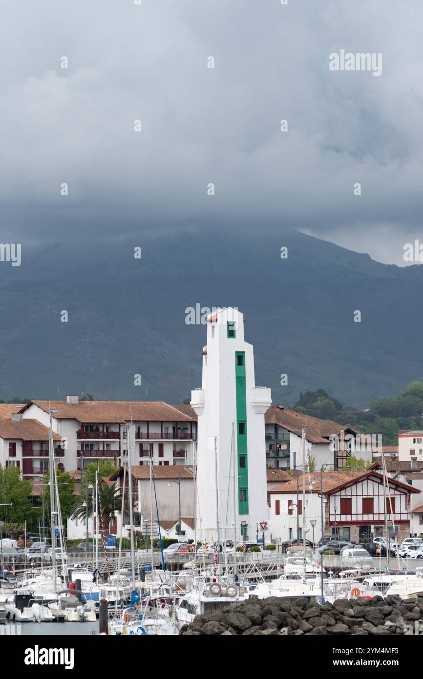 White houses, lighthouse and port of old part of Ciboure and Saint-Jean ...