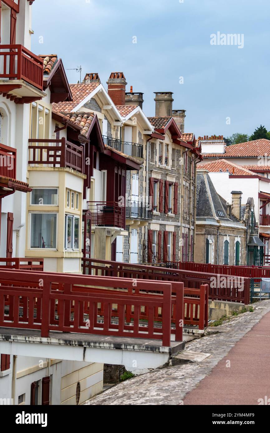 View of houses and streets of old part Saint-Jean-de-Luz fishing port on Basque coast, famous ...