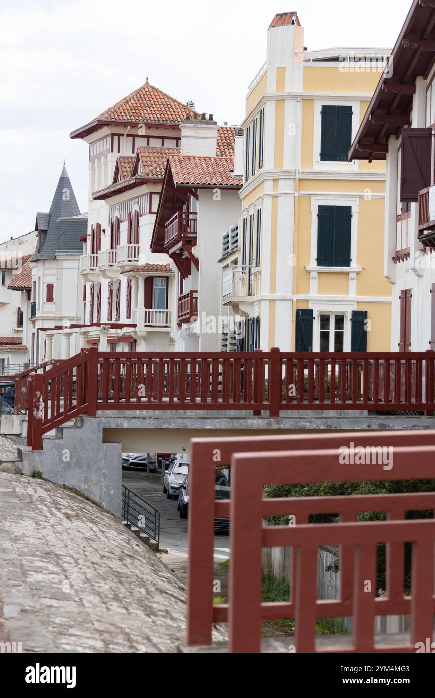View of houses and streets of old part Saint-Jean-de-Luz fishing port on Basque coast, famous ...