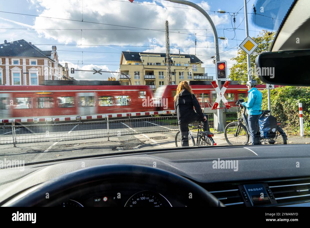 Gated level crossing, closed barrier, St. Andrew's cross, traffic ...