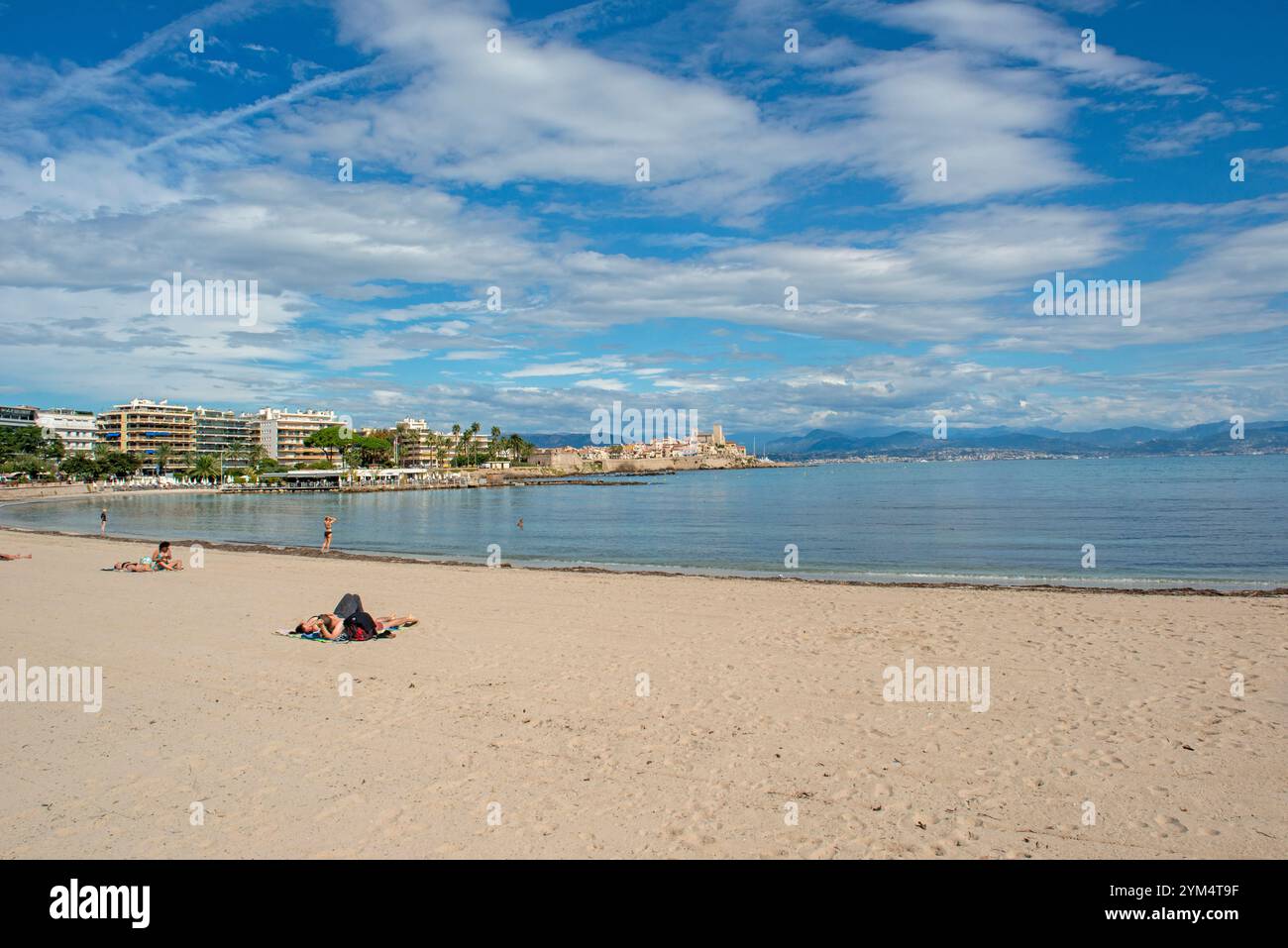 The beach scene in the beuatiful city of Antibes is a resort town ...